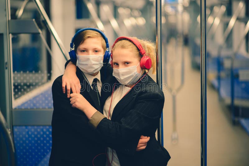 Children with Face Mask Going Back To School after Covid-19 Quarantine ...