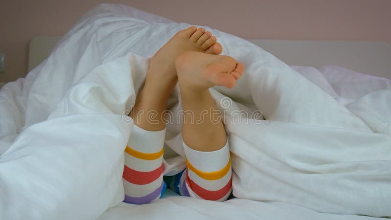Children Feet on the Blanket. Selective Focus Stock Video - Video of ...