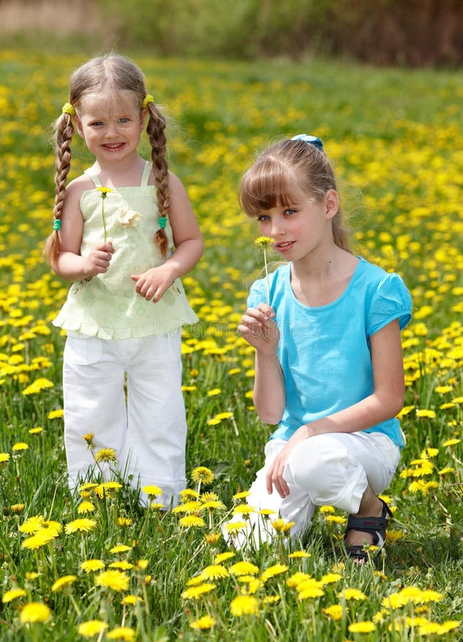 Children in Field with Flower. Stock Photo - Image of human, kids: 14294018