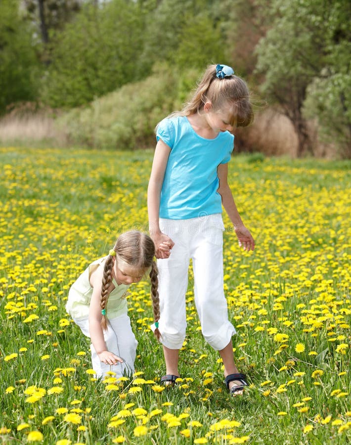 Children in Field with Flower. Stock Photo - Image of beautiful ...