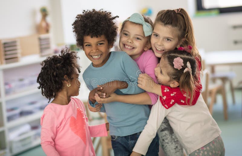 145 Children Group Hug Classroom Stock Photos - Free & Royalty-Free ...