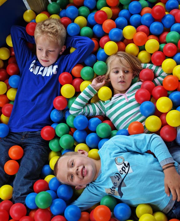 Children in fun balls stock image. Image of indoor, laugh - 21453519