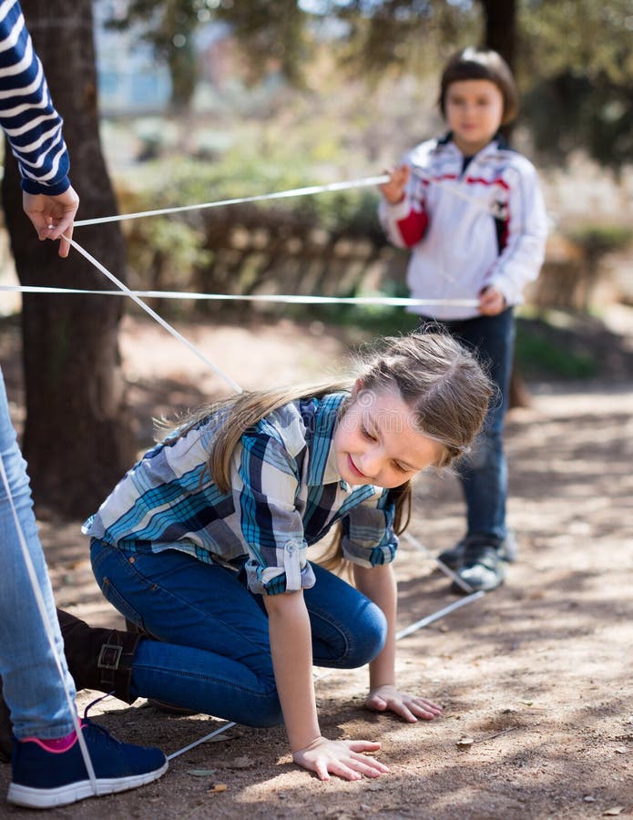 Children Games. Girl Goes through the Tangled Rope Stock Image - Image ...