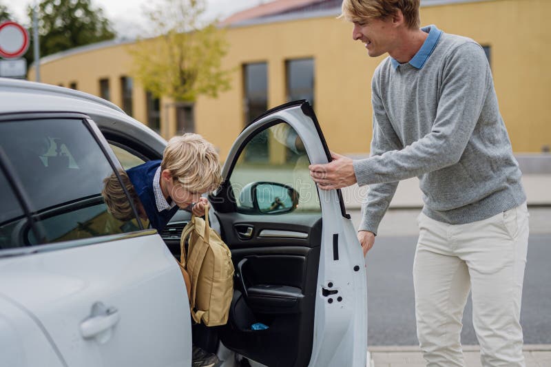 Children Getting into the Car, Father Taking Them To School and ...