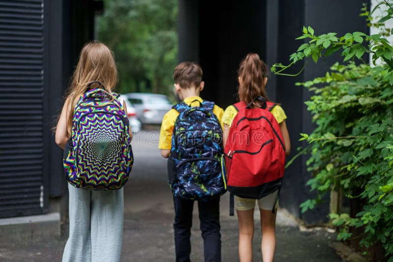 Children Go To School for Study. Classmates with Backpacks. Concept of ...