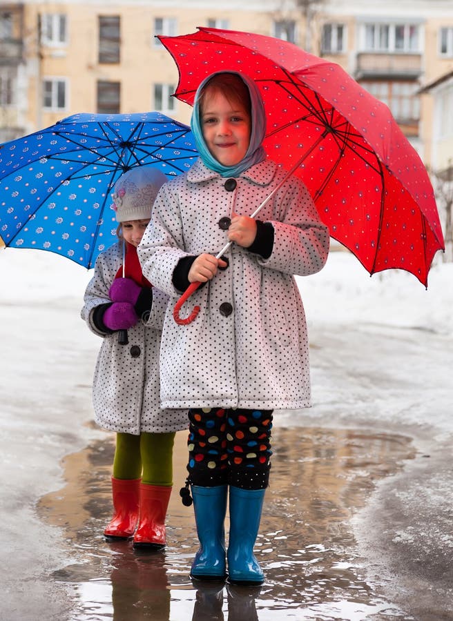 Children Going through Puddles Stock Image - Image of winter, boots ...