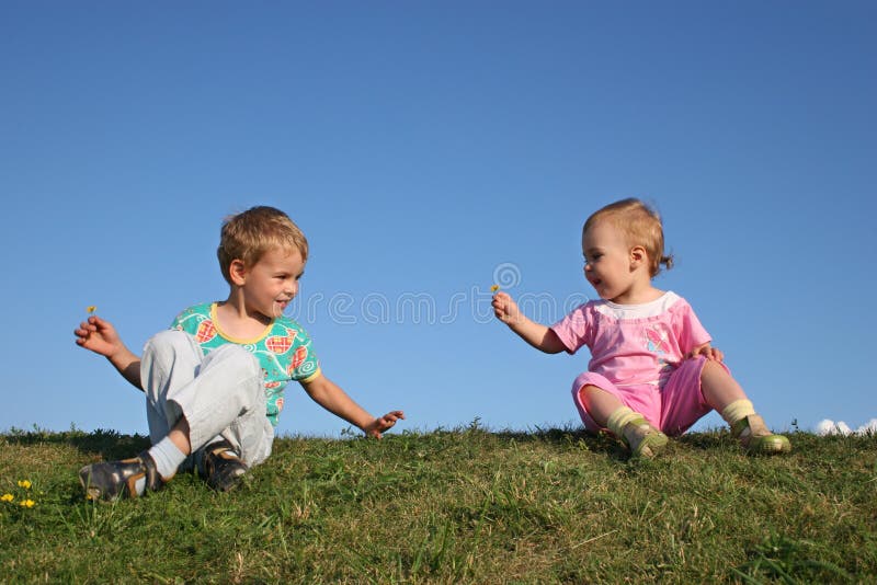Children on grass stock image. Image of beautiful, female - 1030889