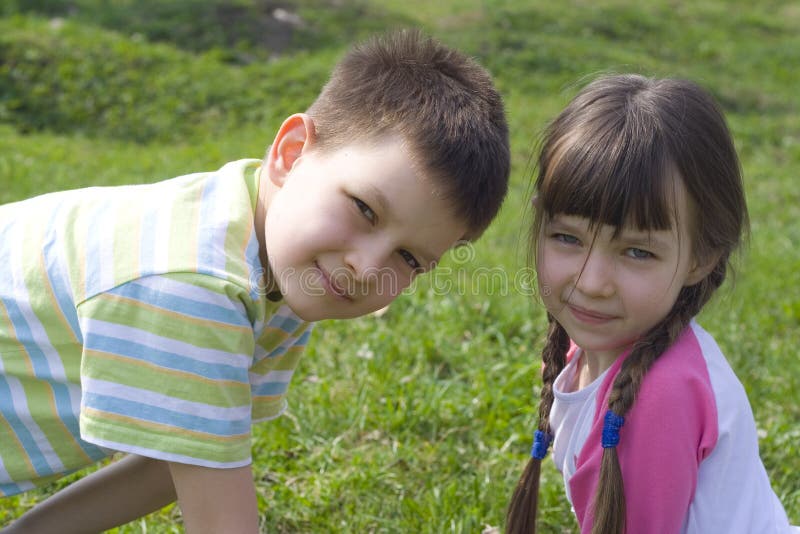 Children in grass stock image. Image of lovely, kids, happiness - 726889