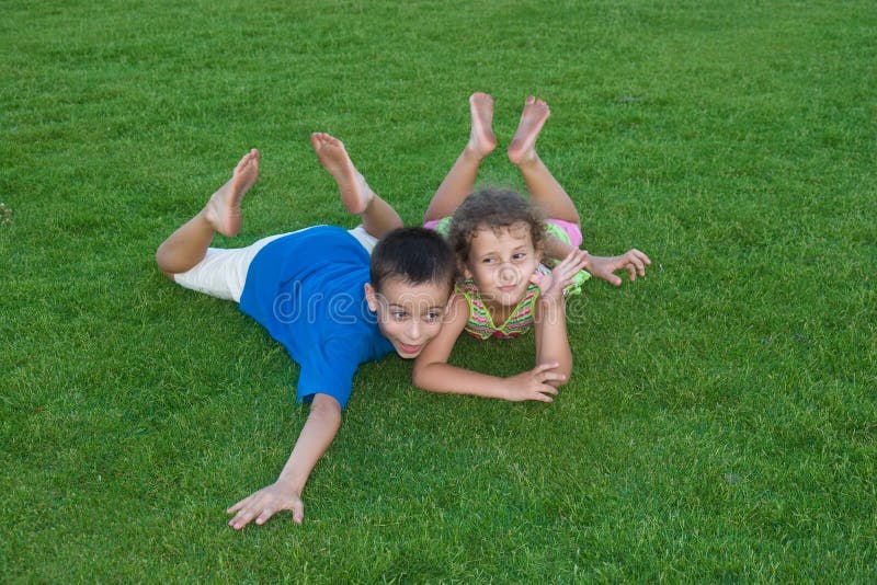 Children on grass stock image. Image of field, smile, summer - 8692585