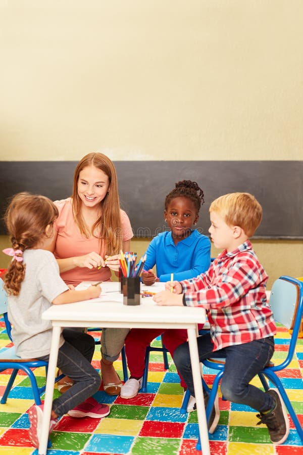 Children Group and Educator while Painting Stock Photo - Image of ...