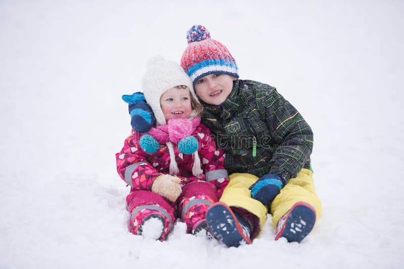 Children Group Having Fun and Play Together in Fresh Snow Stock Image ...
