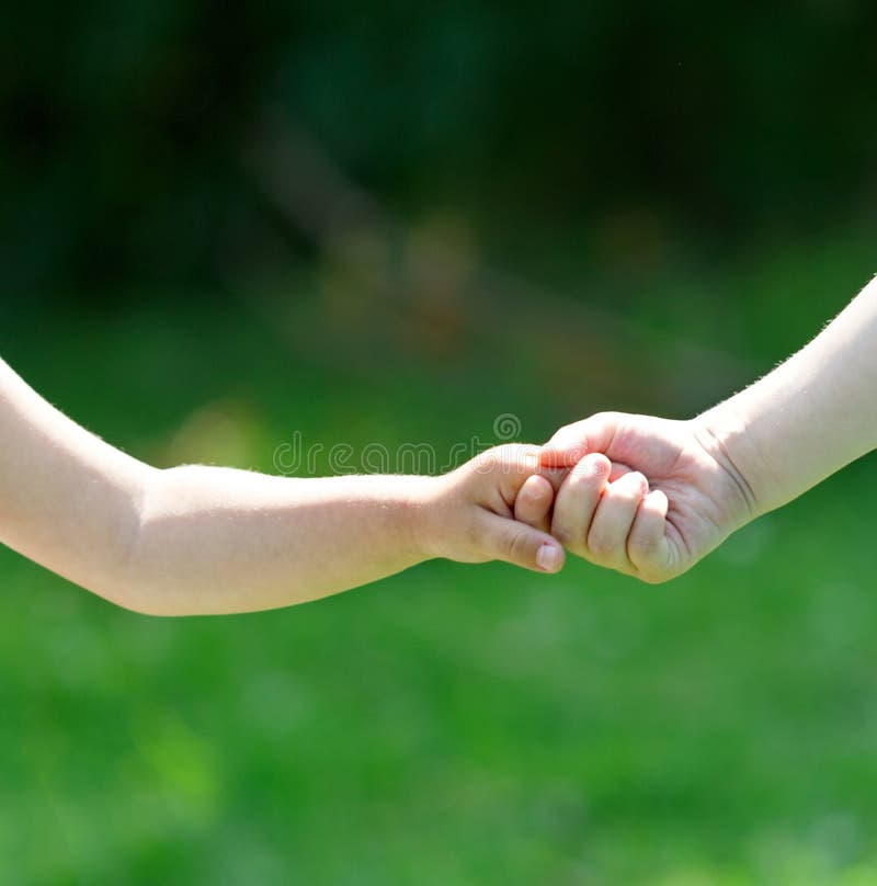 Children hand in hand stock photo. Image of hand, small - 43898954