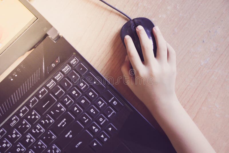The Children Hand is Pressing the Keyboard and the Mouse Online ...