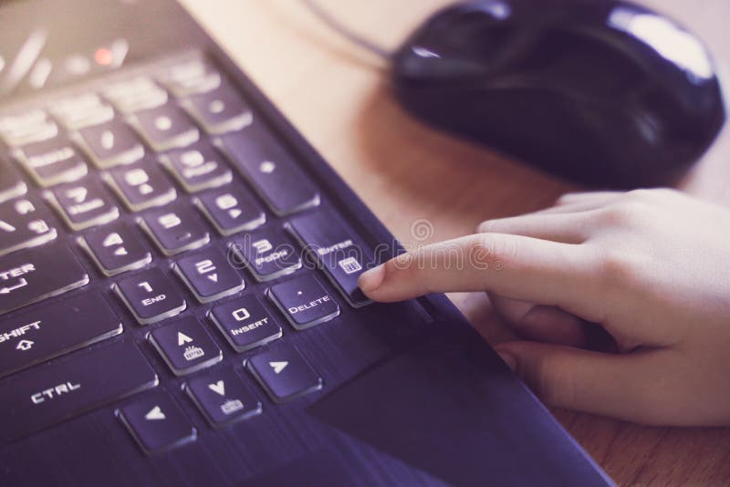 The Children Hand is Pressing the Keyboard and the Mouse Online ...