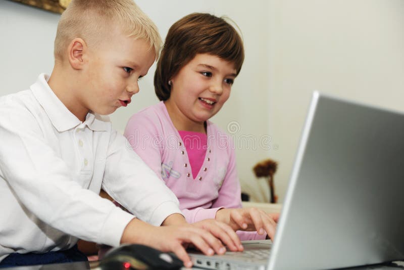Children Have Fun Playing Games on Laptop Computer Stock Photo - Image ...