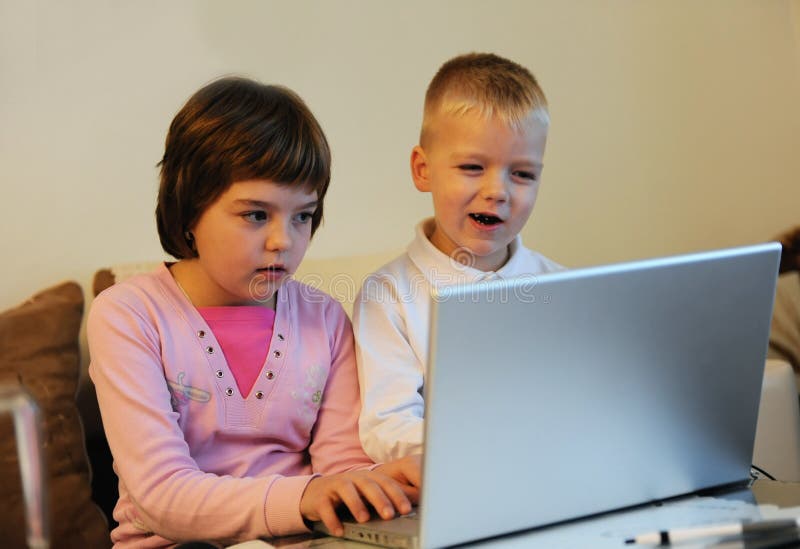 Children Playing on Laptop stock photo. Image of computer - 2088640