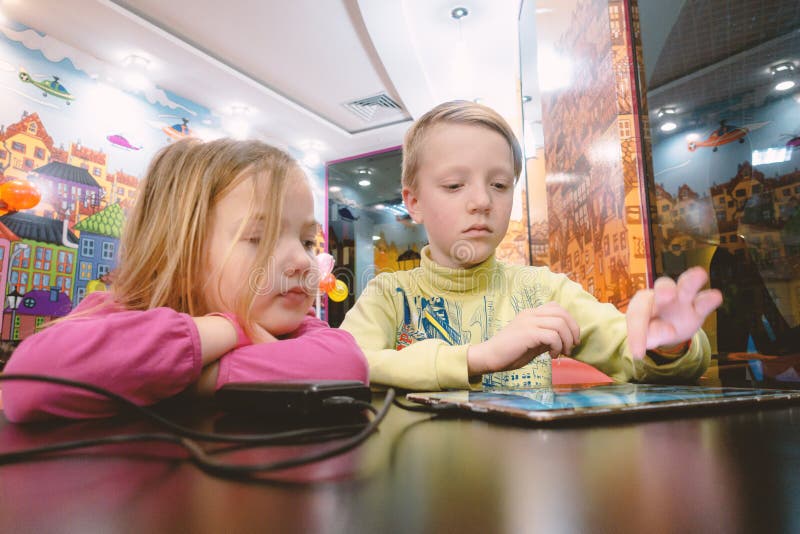 Children Have Fun Using a Tablet Stock Image - Image of house, leisure ...