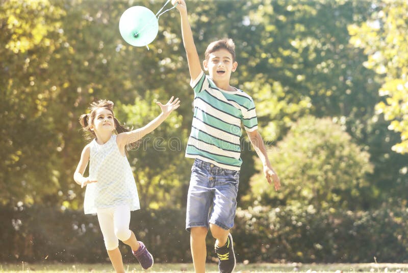 Children Having Fun Outdoors Concept Stock Photo - Image of laughing ...