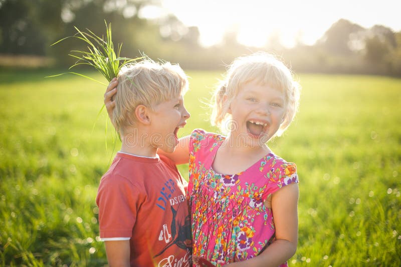 Children Having Fun Outdoors at Summer Stock Photo - Image of field ...