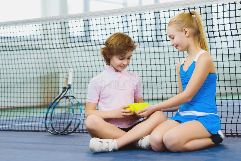 Children Having Fun and Playing on the Tennis Court Stock Photo - Image ...