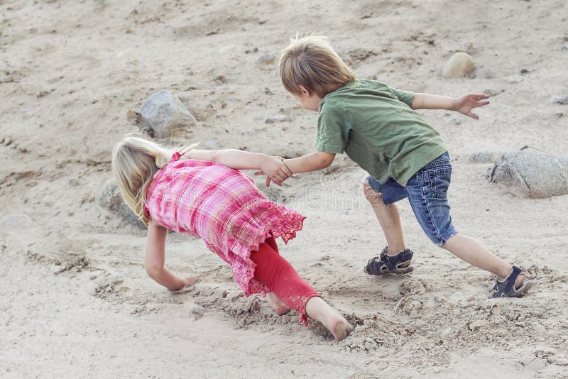 Children Help Each Other. Help Concept Outdoor Stock Photo - Image of ...