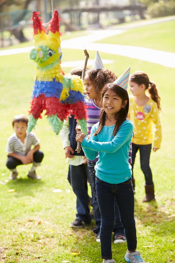 Children Hitting Pinata at Birthday Party Stock Image - Image of donkey ...