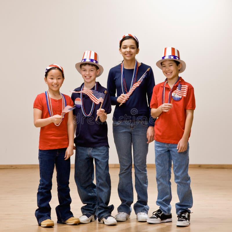 Children Holding American Flag and Wearing Hats Stock Image - Image of ...