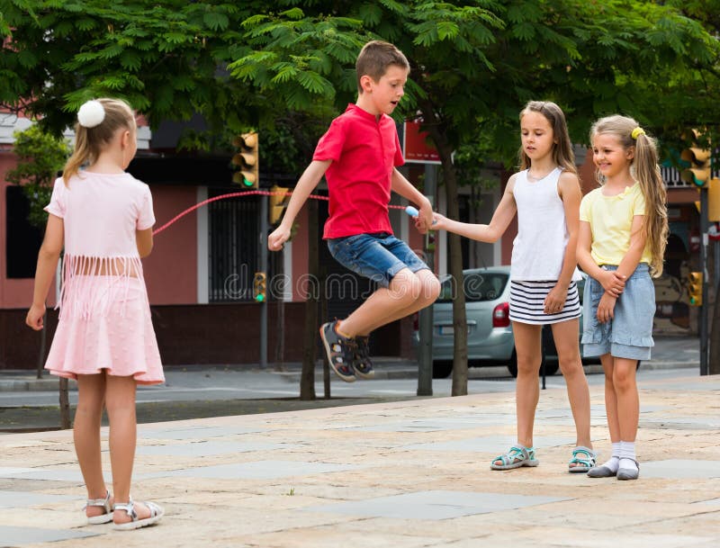 Children with Jumping Rope at Playground Stock Image - Image of ...