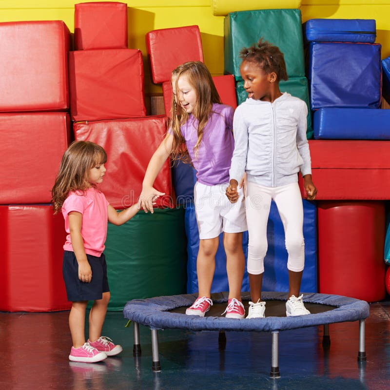 Children Jumping on Trampoline in Gym Stock Image - Image of help ...