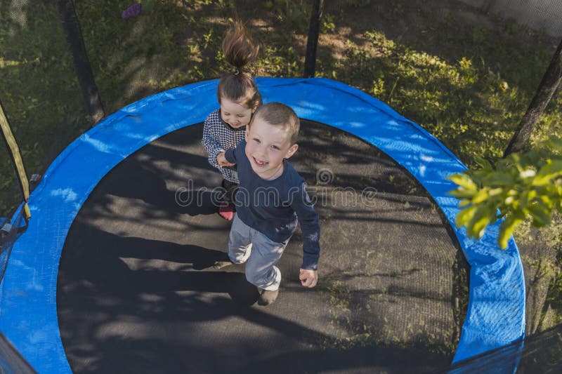 Children Jump on the Trampoline Stock Image - Image of filter, happy ... Children Jump on the Trampoline Stock Image - Image of filter, happy ...