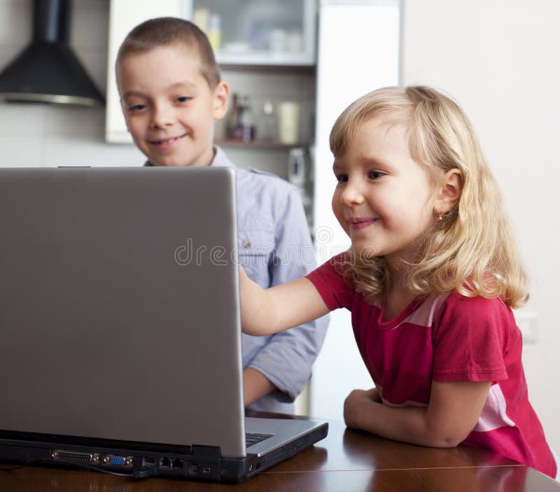 Kids with laptop stock image. Image of home, pensive, education - 4470037