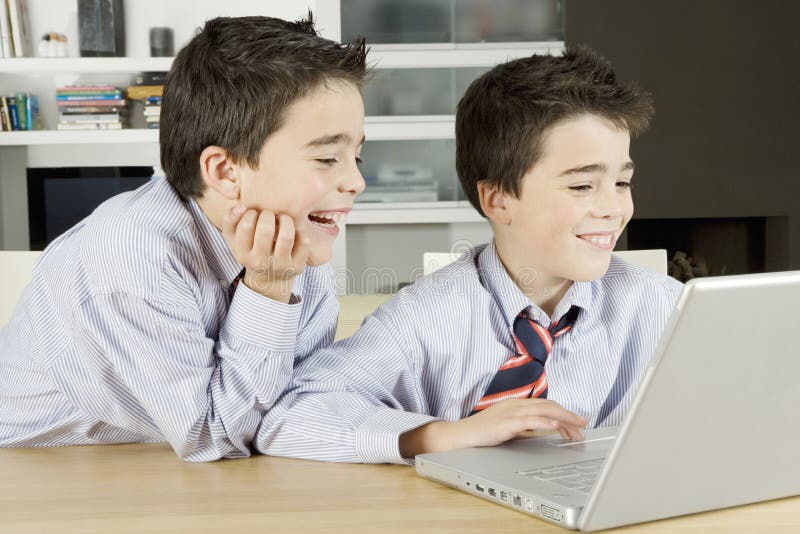 Kid on laptop at home stock image. Image of laptop, indoors - 28832579
