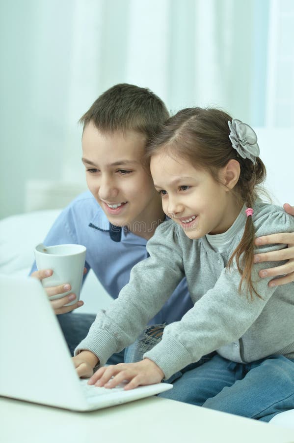 Children with Laptop at Home Stock Image - Image of smiling, expression ...