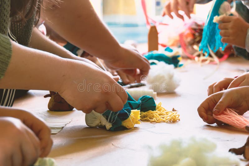 Children Learn How To Make a Rag Doll Stock Photo - Image of instrument ...