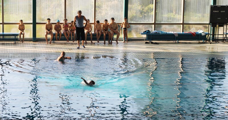 Children learn swimming editorial stock image. Image of healthy - 50694839