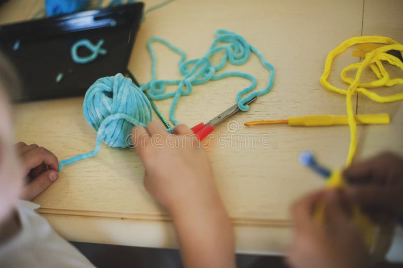 Children Learn To Knit from Colored Threads Stock Photo - Image of ...