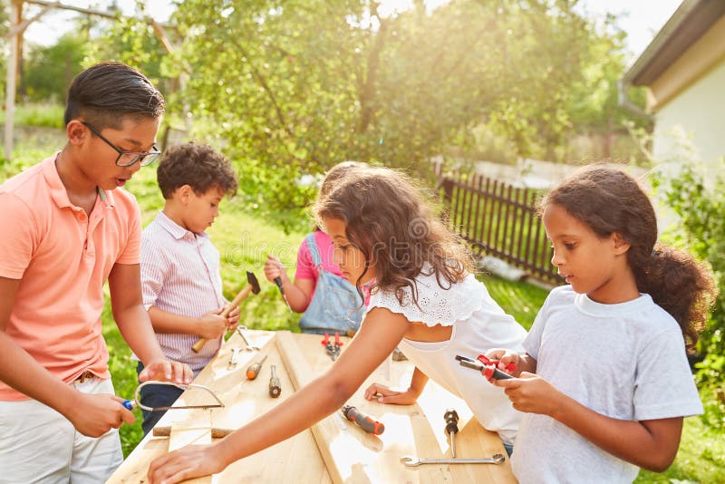 Children Learn To Work with Wood in the Workshop Stock Image - Image of ...