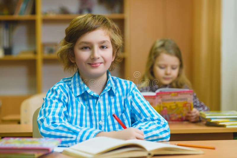 Children Learning and Doing Homework in School Classroom Stock Image ...