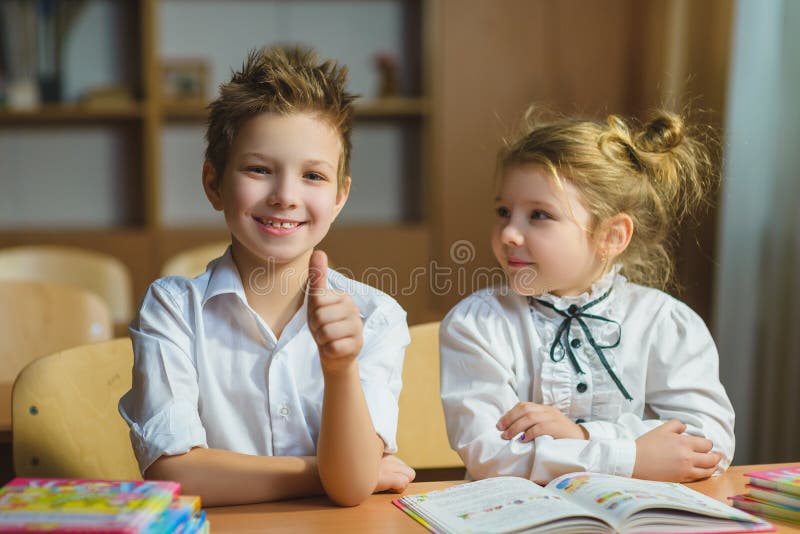 Children Learning and Doing Homework in School Classroom Stock Image ...