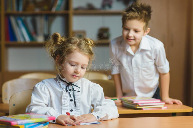Children Learning and Doing Homework in School Classroom Stock Image ...