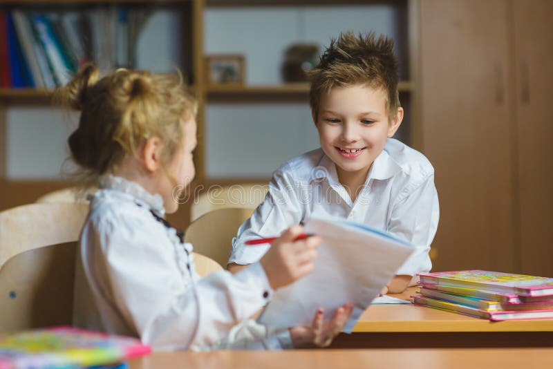Children Learning and Doing Homework in School Classroom Stock Photo ...