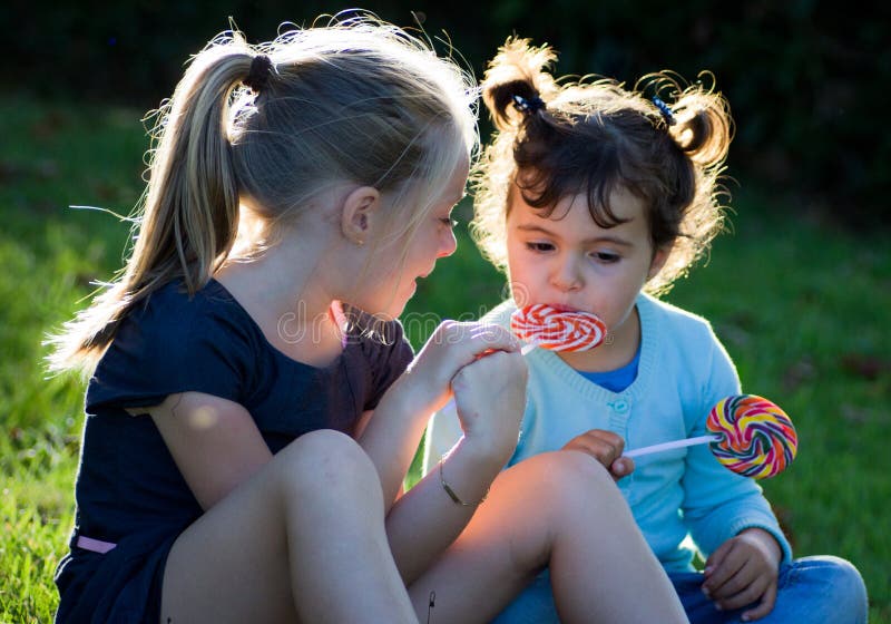 Children with Lollipop Candy Stock Photo - Image of female, face: 27445692