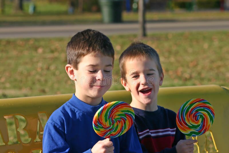 Brothers Two Lollipops Stock Photos - Free & Royalty-Free Stock Photos ...