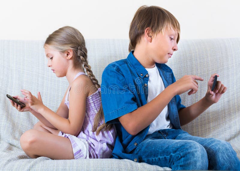 Children Looking At Smartphones Stock Image - Image of freetime ...