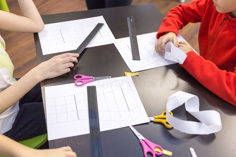 Children Make Crafts Out of Paper on the Stock Photo - Image of craft ...