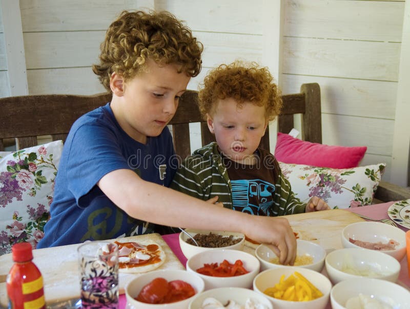Children making Pizza stock photo. Image of creating - 11890880