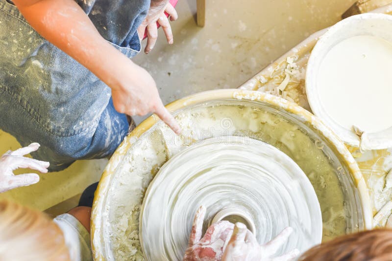 Children Making Pottery during Ceramic Lesson with Clay Stock Image ...