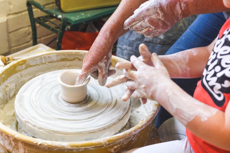Children Making Pottery during Ceramic Lesson with Clay Stock Photo ...