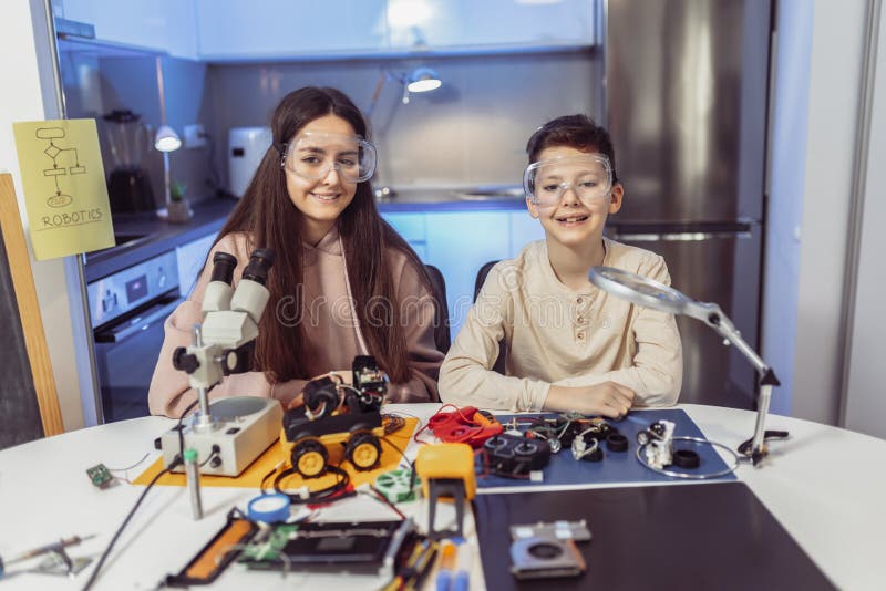 Children Making a Robot at Home. Stock Photo - Image of indoors ...