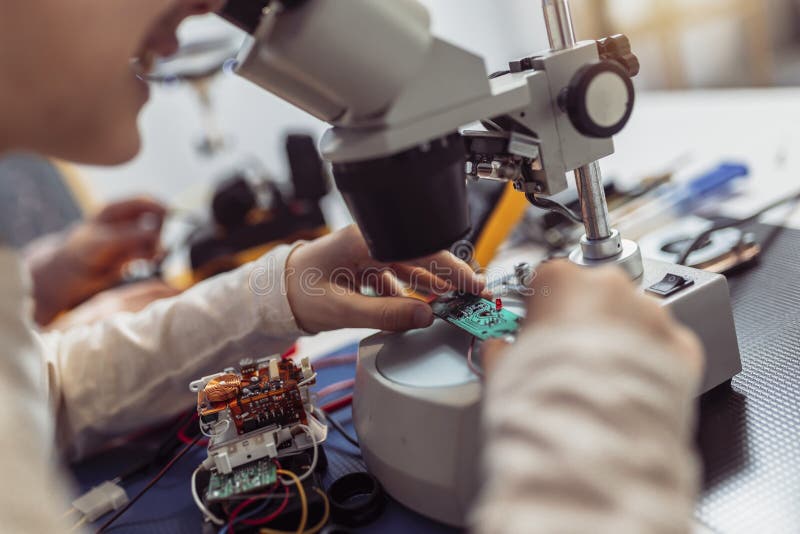 Children Making a Robot at Home. Stock Image - Image of children ...